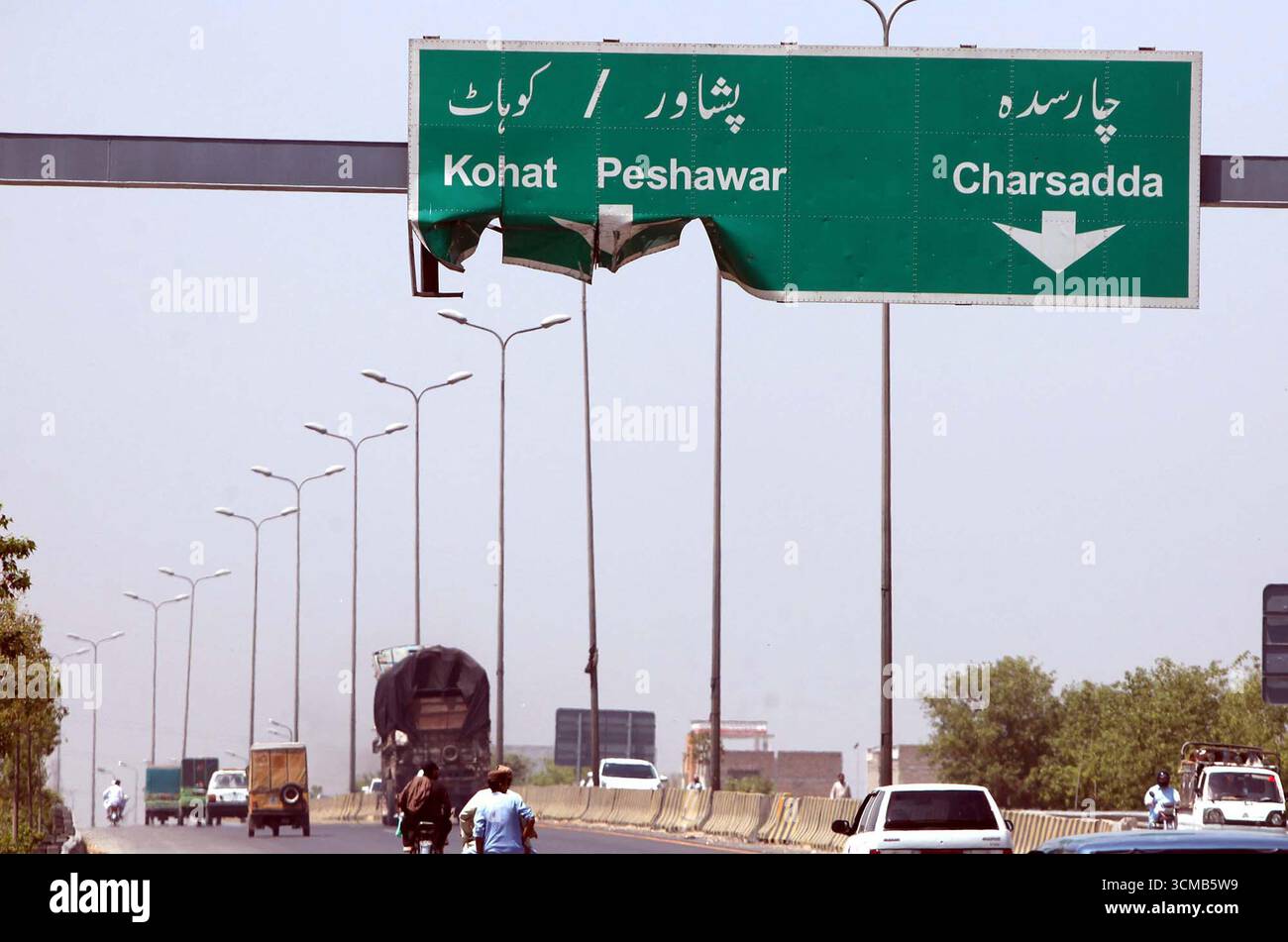 PESHAWAR, PAKISTAN, SEP 15: View of damaged place identification sign ...