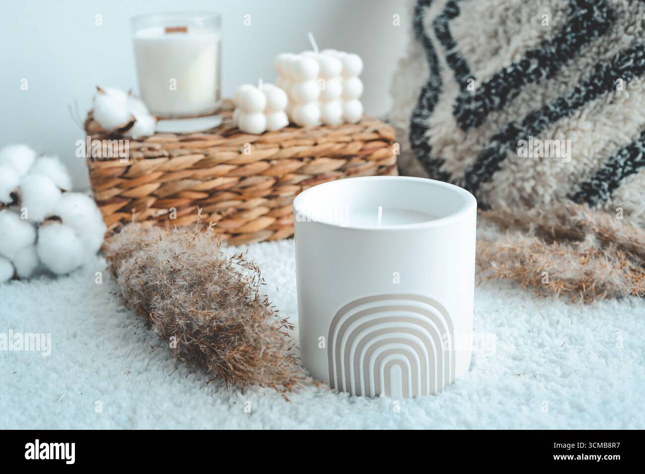 Candle in boho style hi-res stock photography and images - Alamy