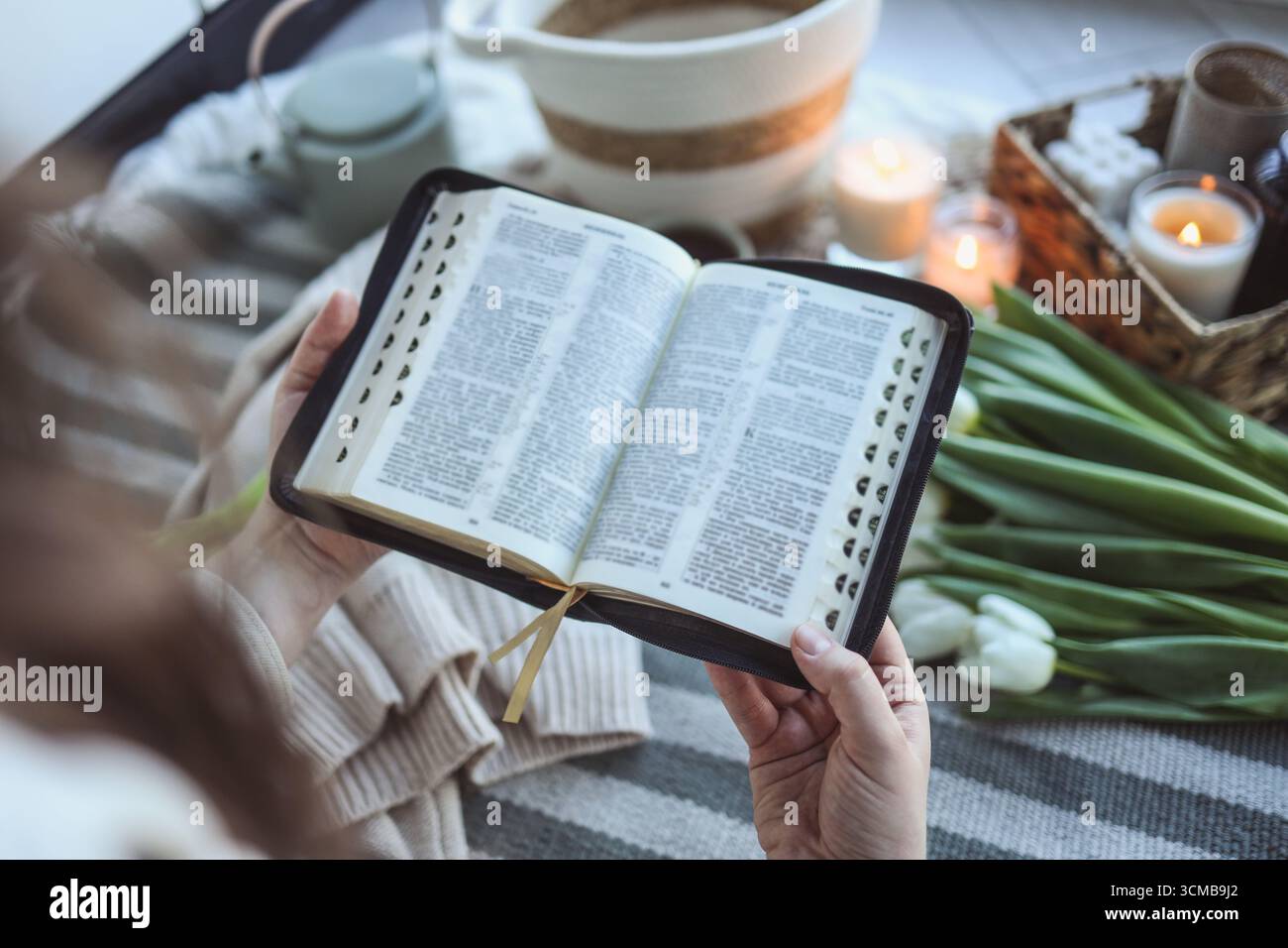 Open bible in hands, christian concept Stock Photo - Alamy