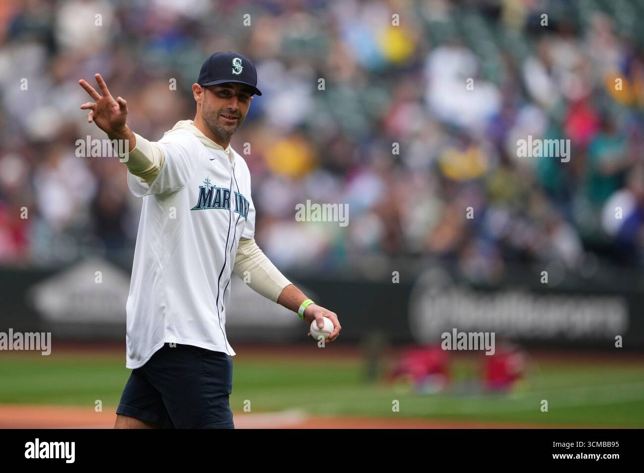 Seattle Kraken right wing Jordan Eberle waves before throwing the ...