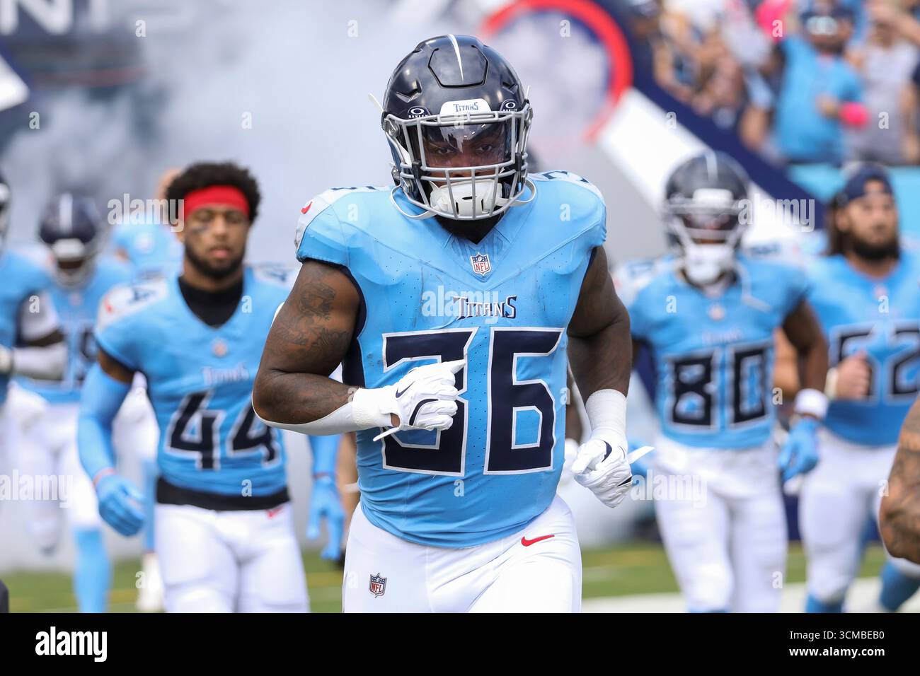 Tennessee Titans running back Julius Chestnut (36) runs onto the field ...
