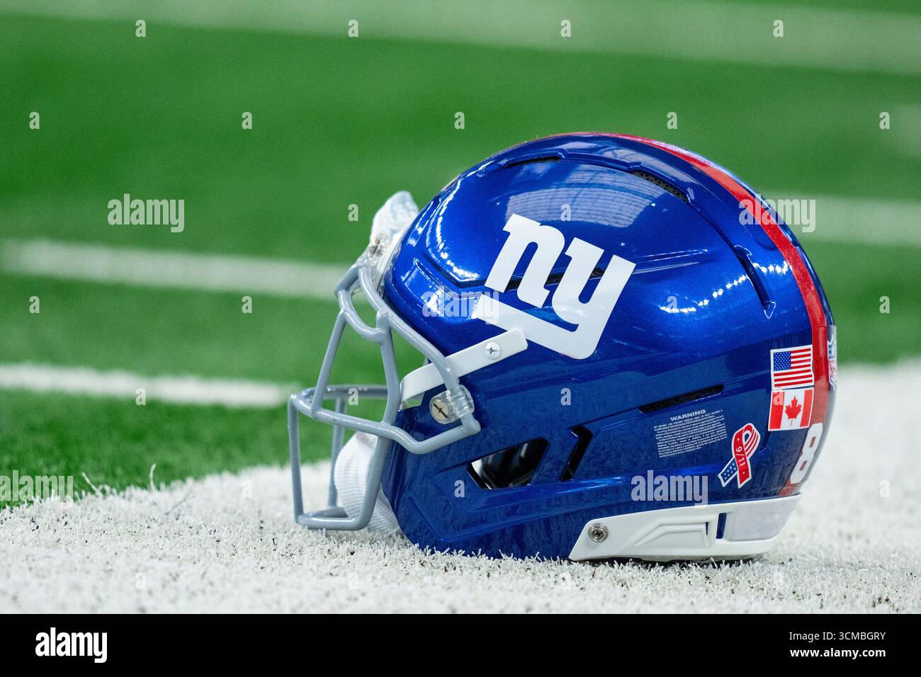 A New York Giants helmet is visible on the field during an NFL football ...