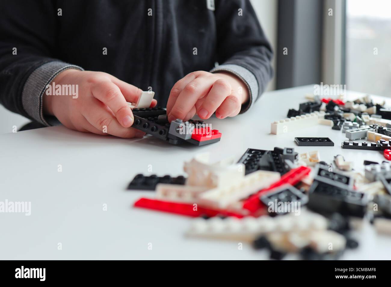 Kids playing constructor toys hi-res stock photography and images - Alamy