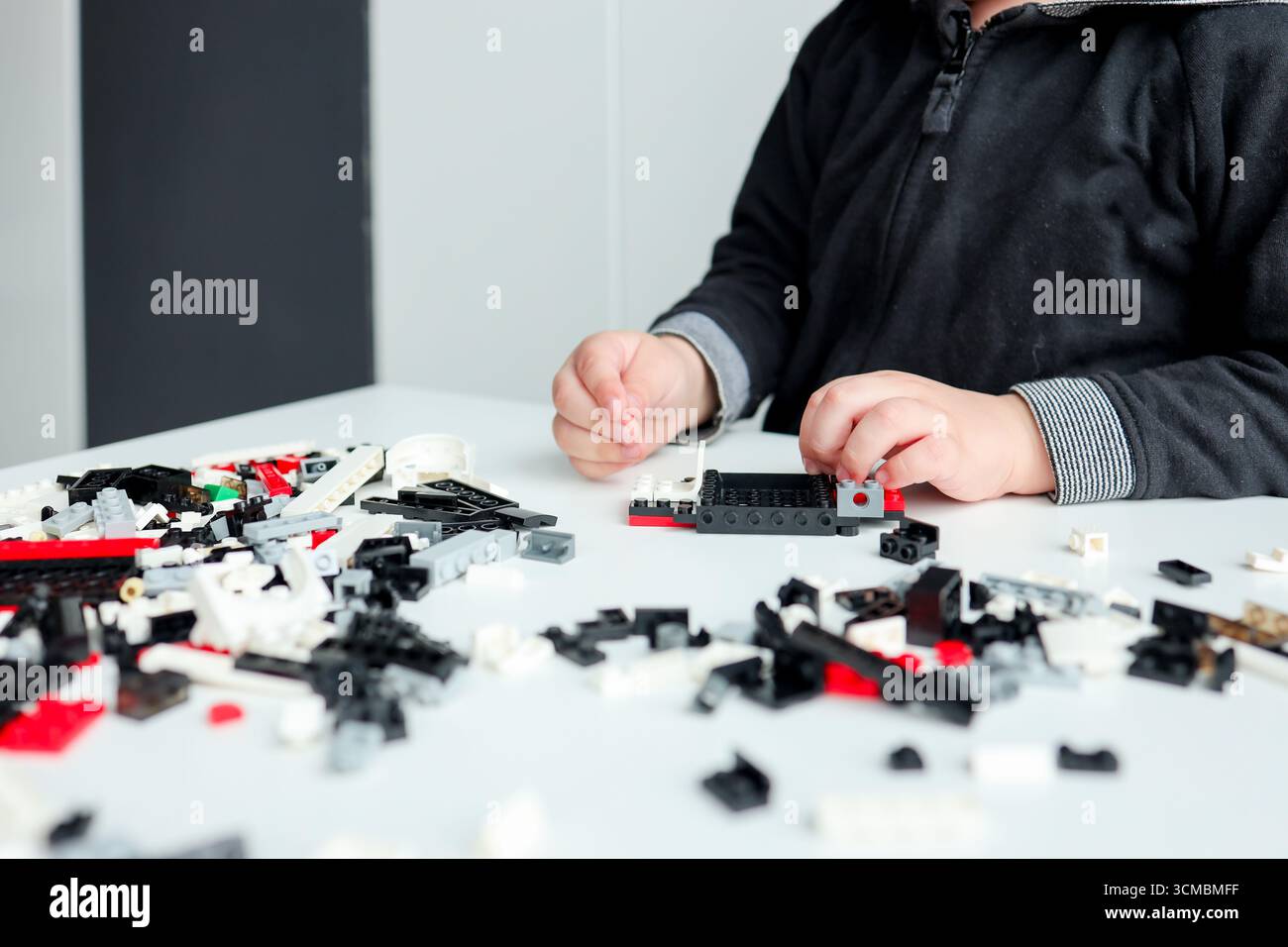 Kids playing constructor toys hi-res stock photography and images - Alamy