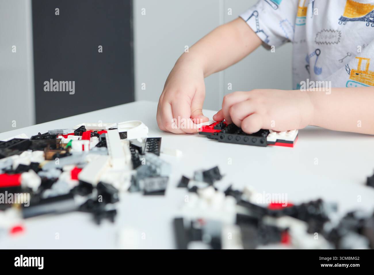 Kids playing constructor toys hi-res stock photography and images - Alamy