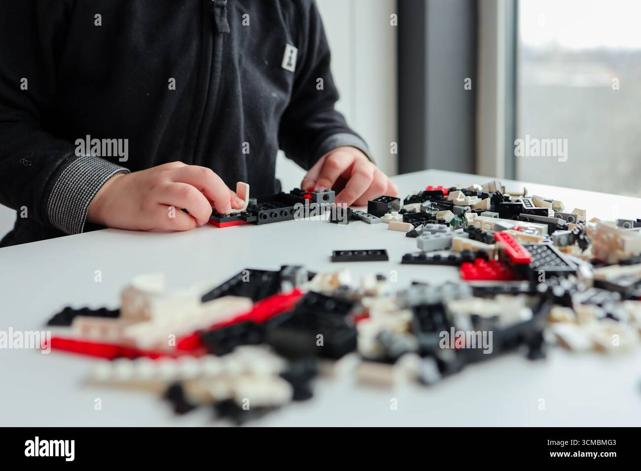 Kids playing constructor toys hi-res stock photography and images - Alamy