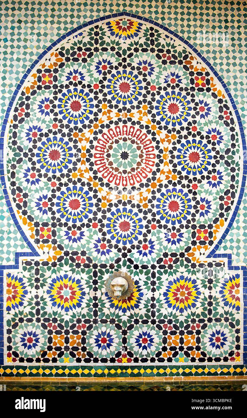 Detailed mosaic wall displays vibrant geometric patterns and floral ...