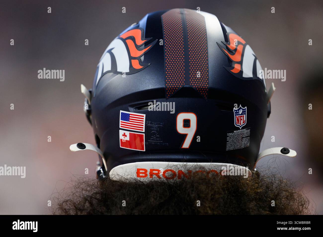 Denver Broncos safety Talanoa Hufanga (9) wears a international decal ...