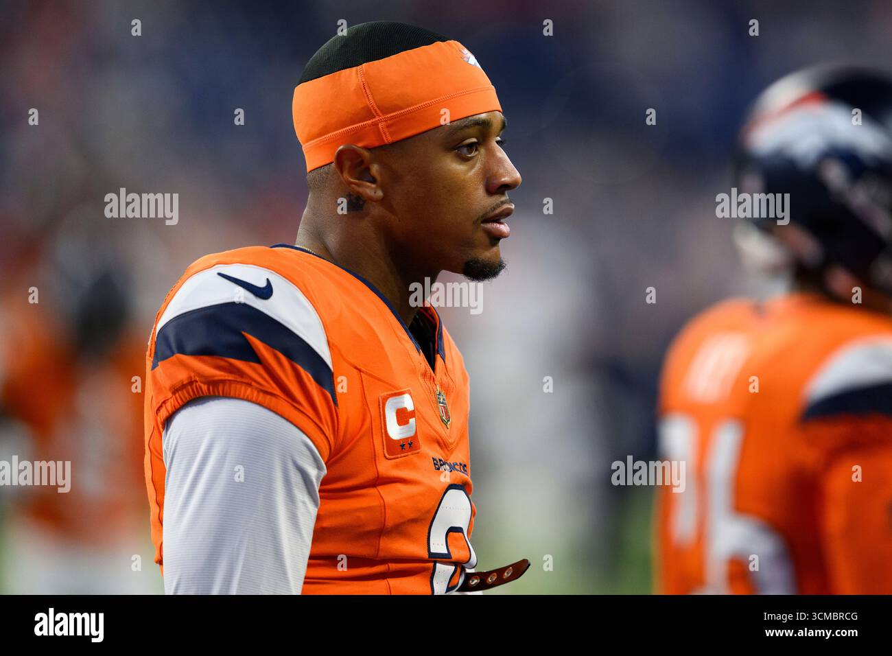 Denver Broncos cornerback Pat Surtain II (2) warms up on the field ...