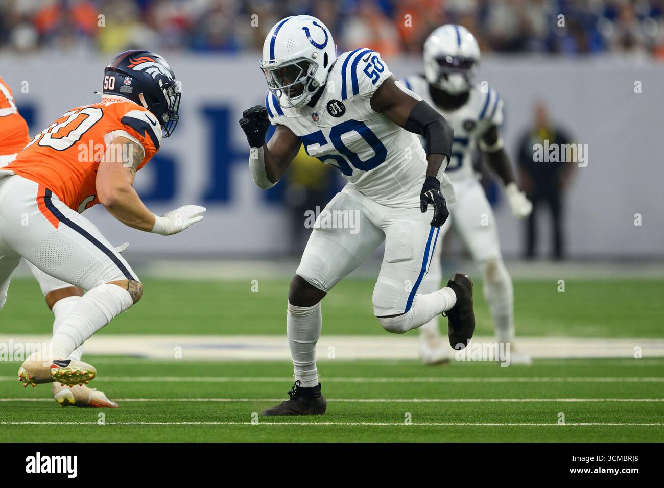 Indianapolis Colts linebacker Segun Olubi (50) rushes around the edge ...