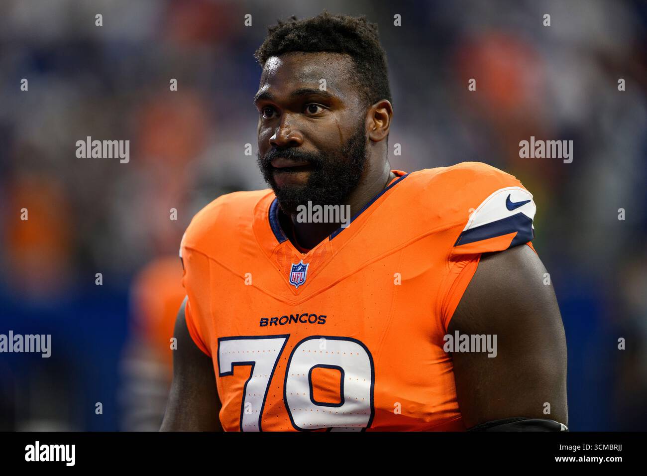 Denver Broncos tackle Matt Peart (79) warms up on the field before an ...