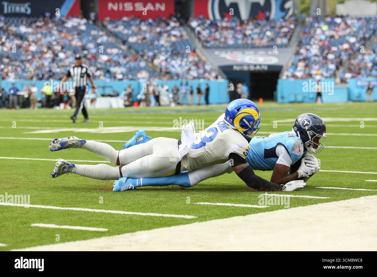 Los Angeles Rams safety Kam Curl (3) and Tennessee Titans wide receiver ...