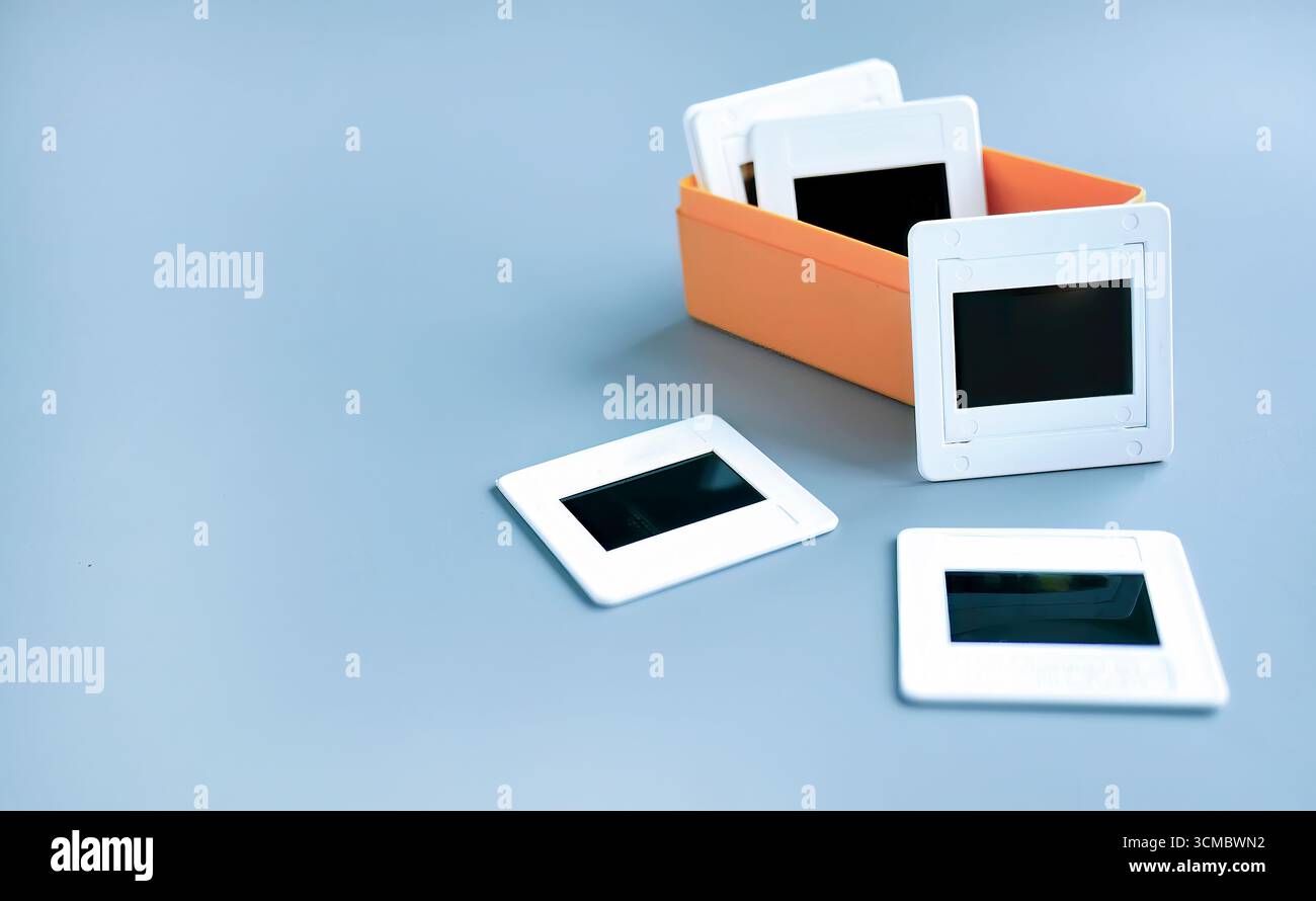 White Plastic Slide Frame Mount for slide film contained in orange ...