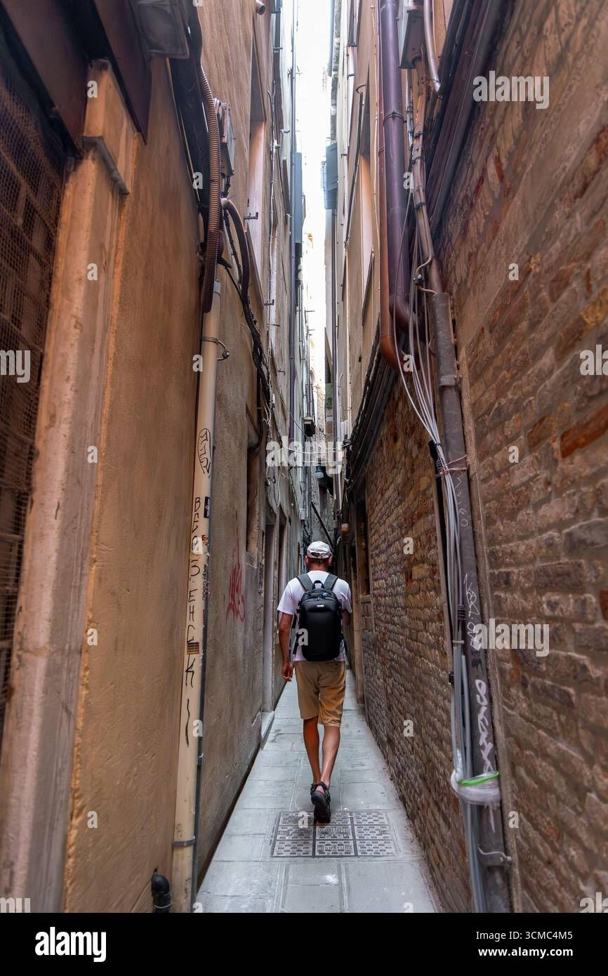 Traveler walks on narrow hi-res stock photography and images - Alamy