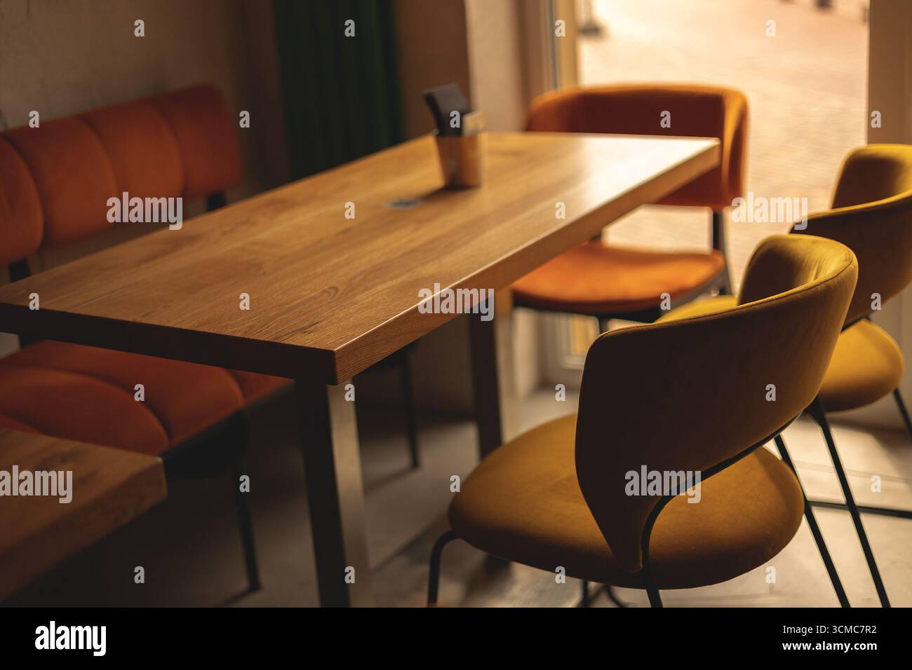 Cafe interior wooden furniture lighting hi-res stock photography and ...