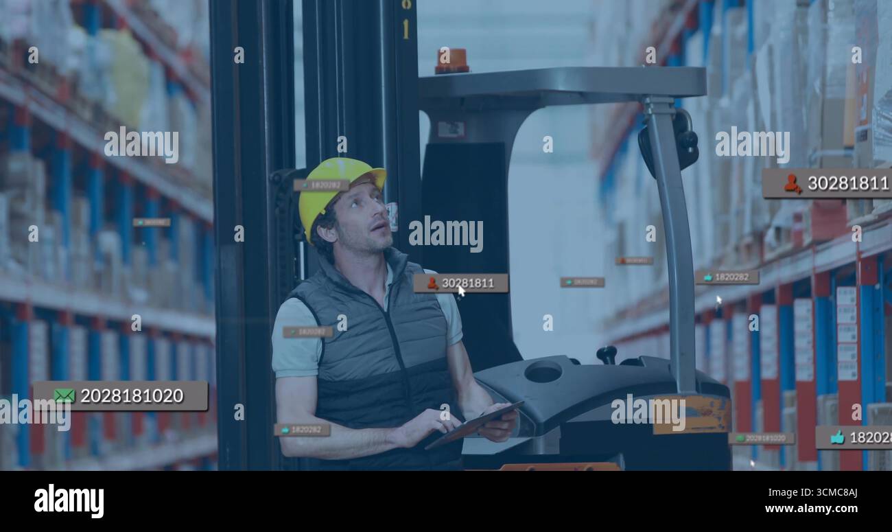 Operating forklift driver using tablet in warehouse aisle, wearing safety helmet and vest Stock ...