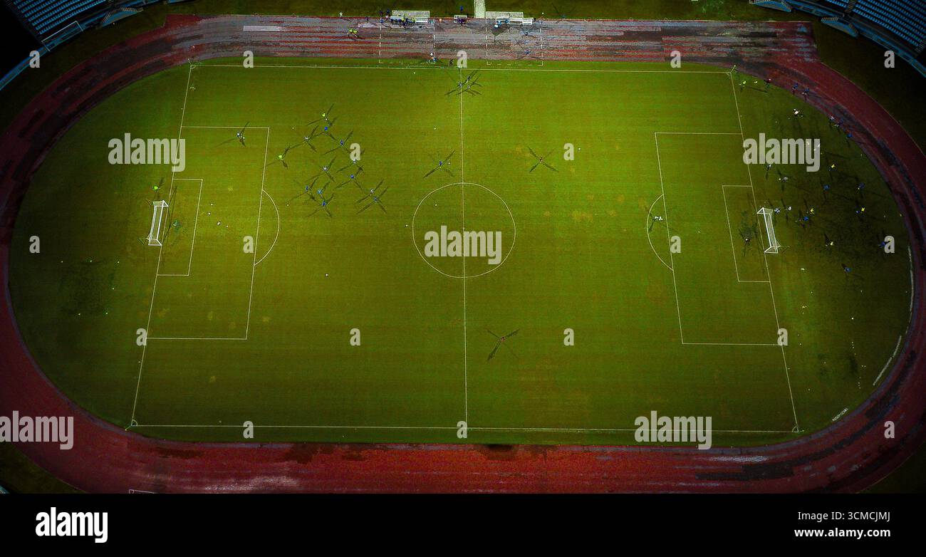 Overhead view of a football field at night in Trinidad Stock Photo - Alamy