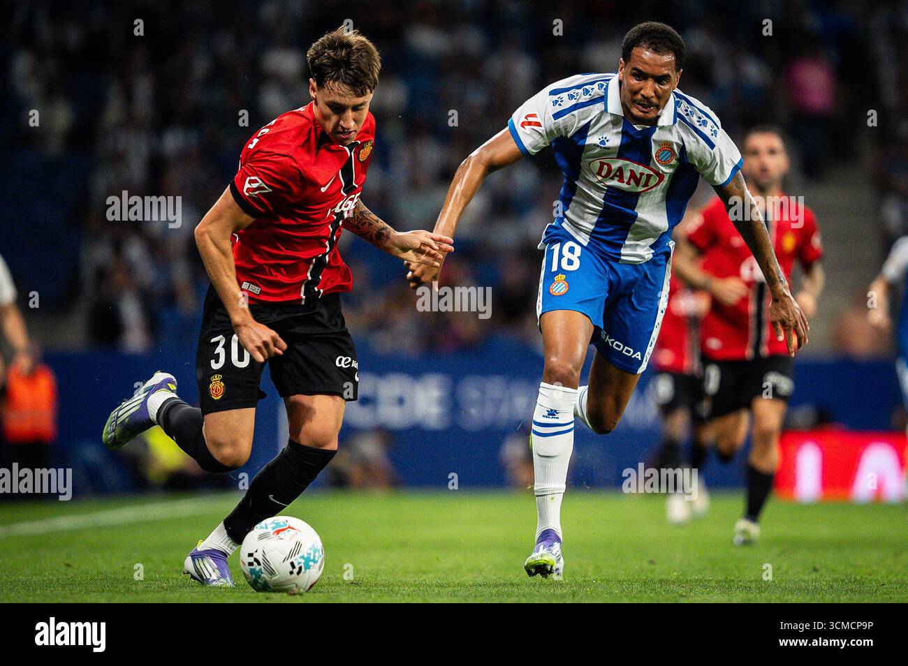 Marc DOMENECH of RCD Mallorca and Charles PICKEL of Espanyol Barcelona ...
