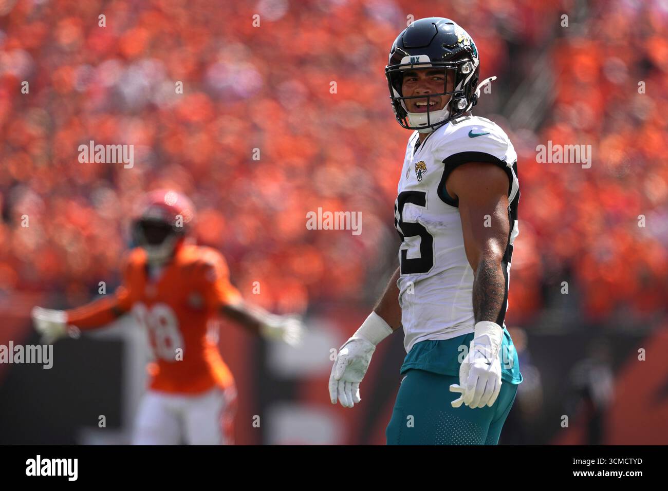 Jacksonville Jaguars tight end Brenton Strange looks toward an official ...