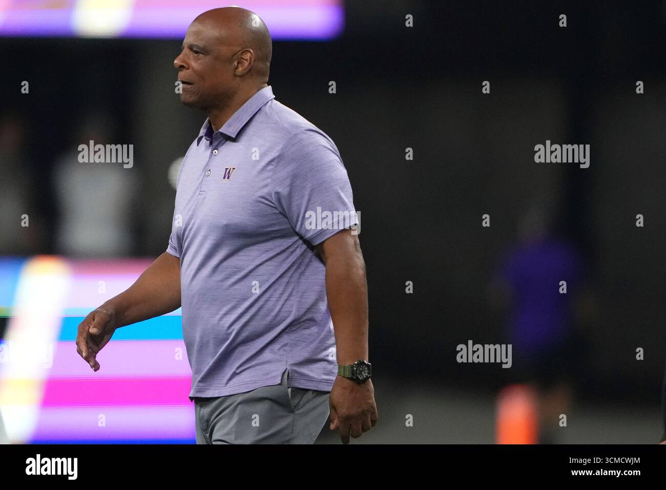 Former NFL quarterback Warren Moon walks on the field before an NCAA ...