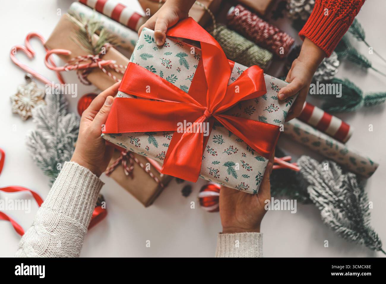 Mom gives child christmas hi-res stock photography and images - Alamy