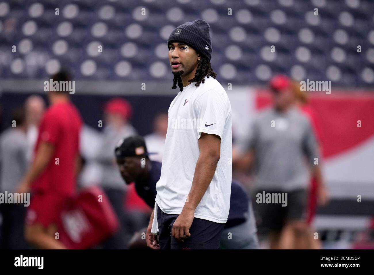 Houston Texans quarterback C.J. Stroud warms up before an NFL football ...