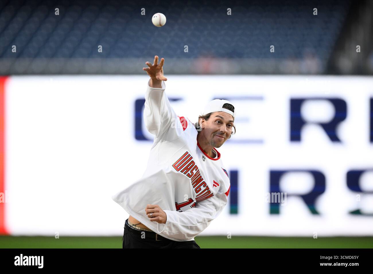 Washington Capitals NHL hockey player Dylan Strome throws out a ...