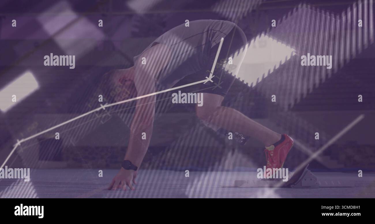 Positioning male sprinter bending knees and planting hands on athletics ...