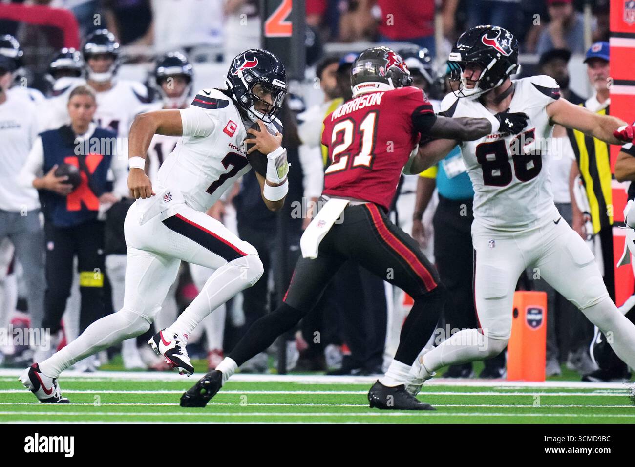 Houston Texans quarterback C.J. Stroud (7) runs the ball as Dalton ...