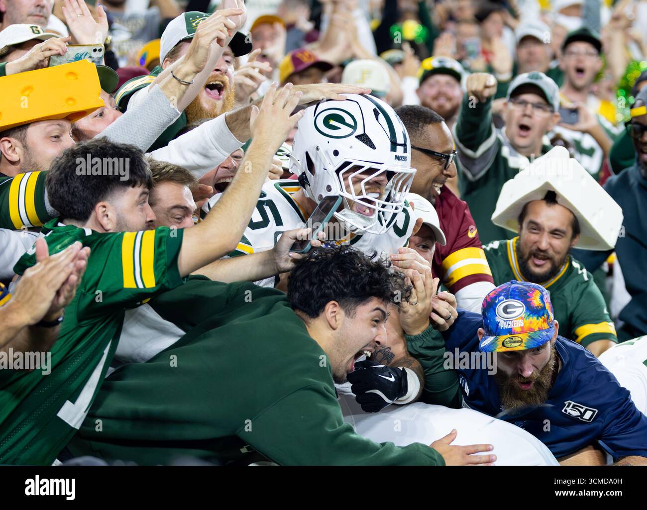 Green Bay, WI, USA; Green Bay Packers fans celebrate with tight end ...