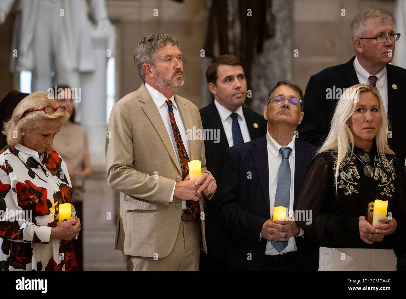 Rep. Thomas Massie (R-Ky.), second from left, stands with other members ...