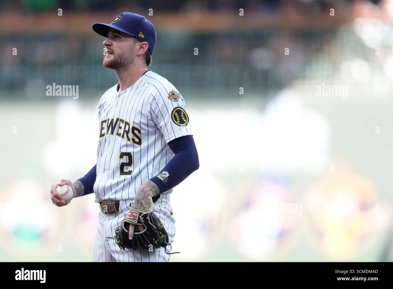 Milwaukee Brewers' Brice Turang looks on during a baseball game against ...