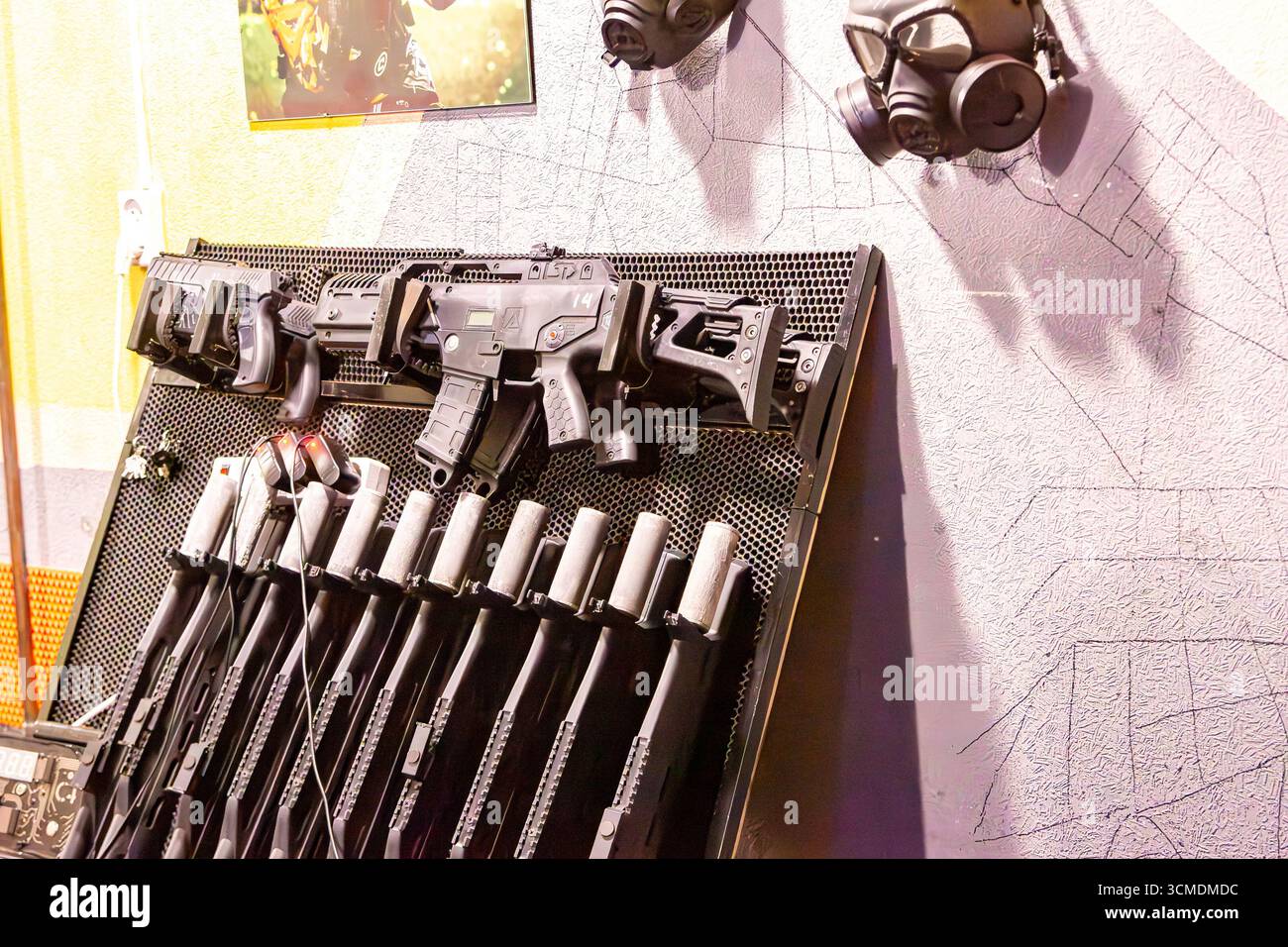 Laser tag weapons on wall hi-res stock photography and images - Alamy