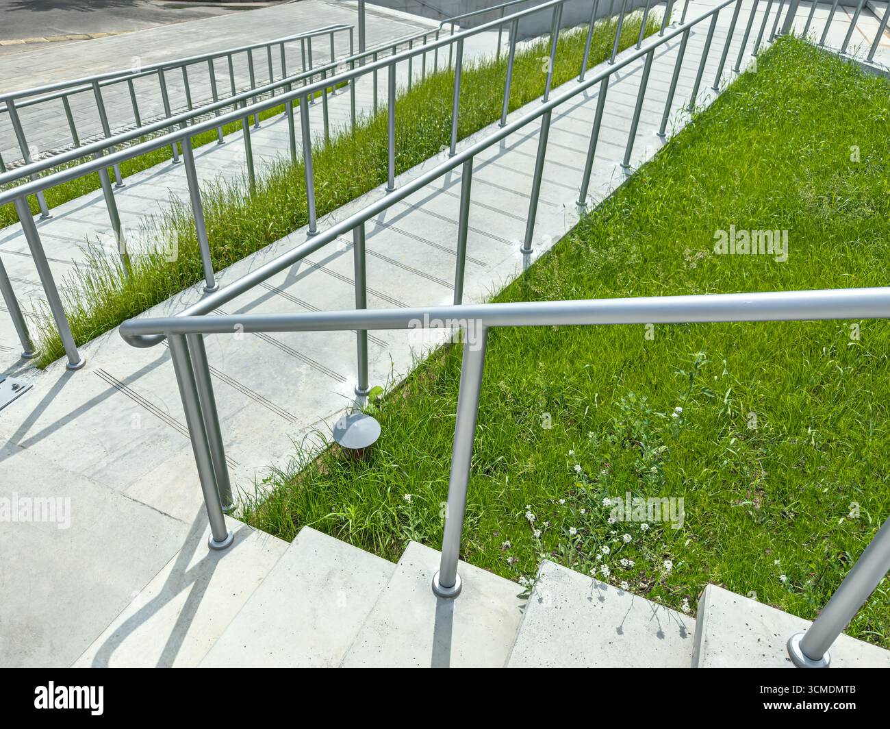 outdoor stairs with ramp and metal safety handrails for wheelchairs ...
