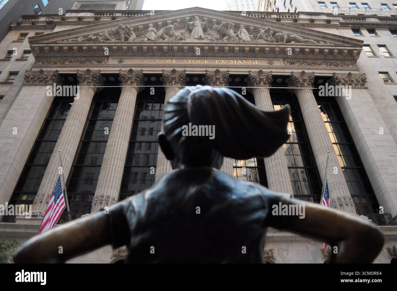 The "Fearless Girl" statue is seen in front of the New York Stock ...
