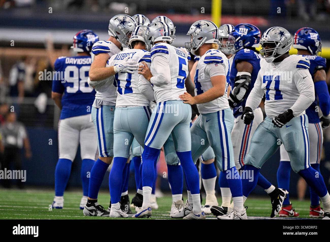 Dallas Cowboys guard Tyler Booker (52), guard T.J. Bass (66), long ...