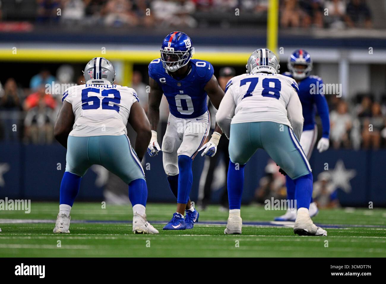 Dallas Cowboys guard Tyler Booker (52) and offensive tackle Terence ...