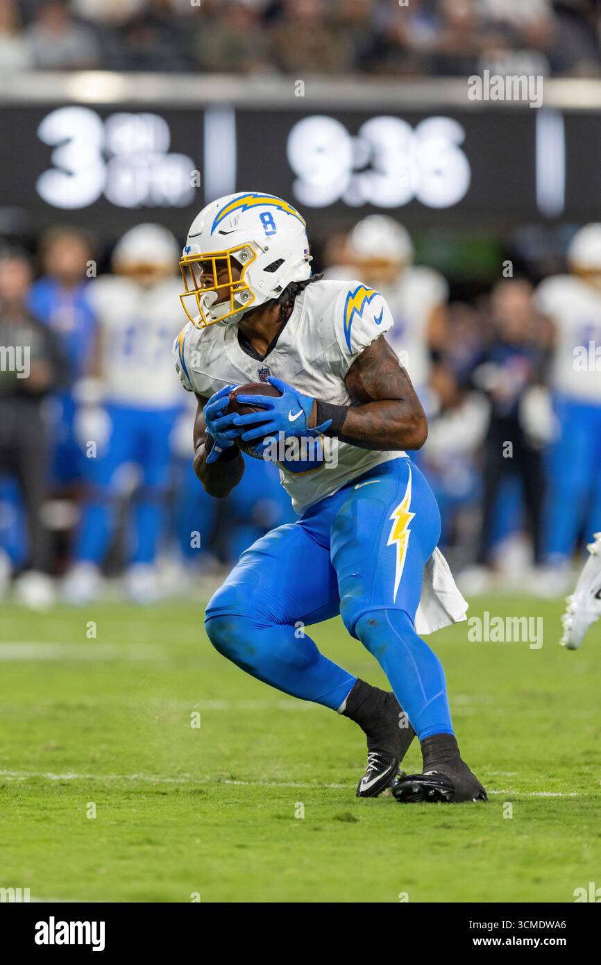 Los Angeles Chargers running back Omarion Hampton (8) runs the ball ...