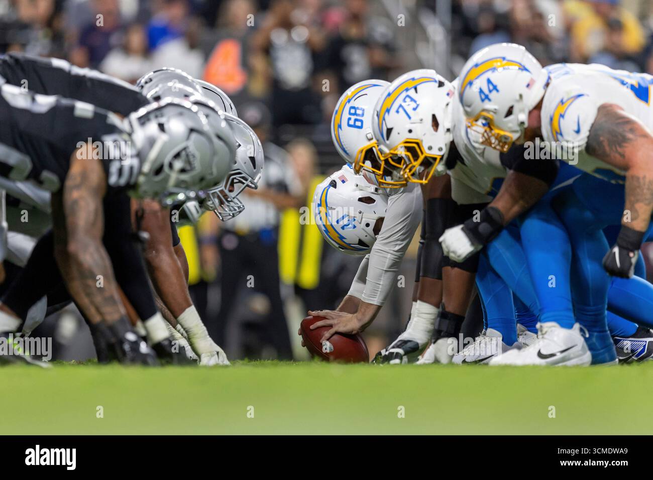 The Los Angeles Chargers line up against the Las Vegas Raiders in an ...