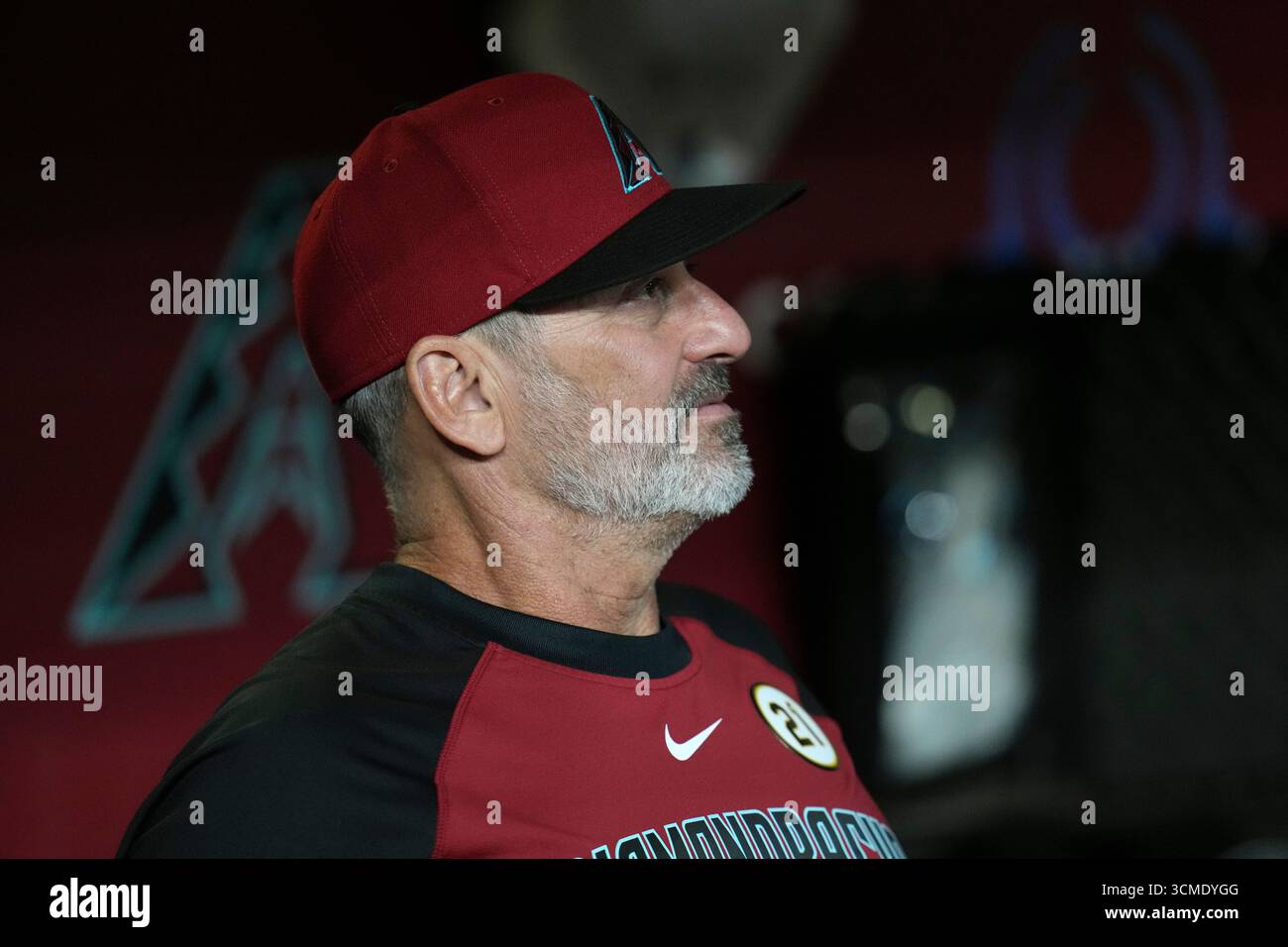 Arizona Diamondbacks manager Torey Lovullo pauses in the team dugout ...