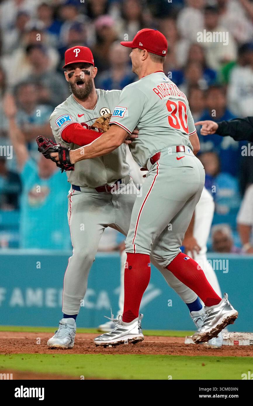 Philadelphia Phillies' Bryce Harper, left, and David Robertson ...