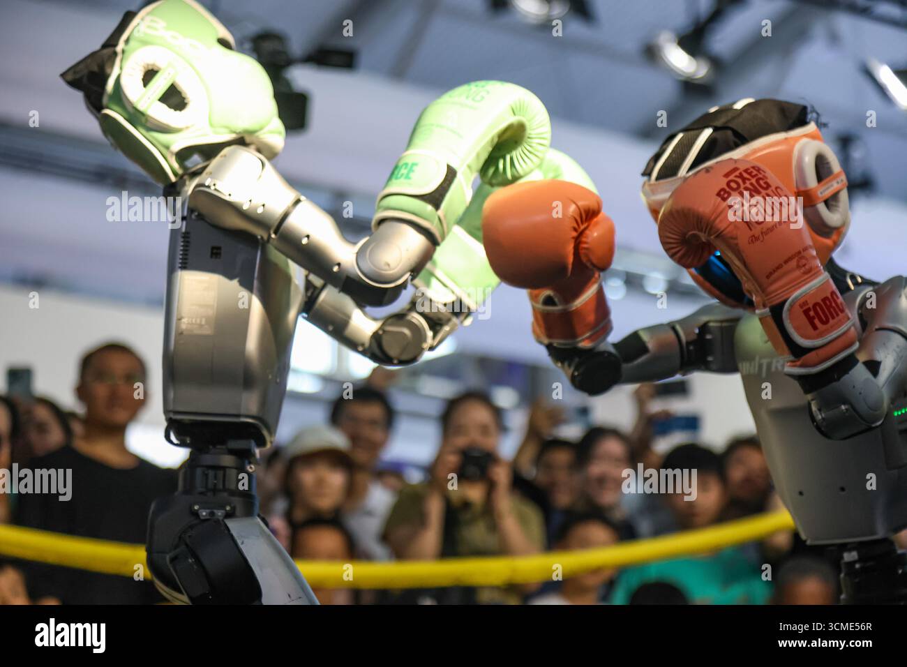 A robot boxing competition captivates visitors during the 2025 ...