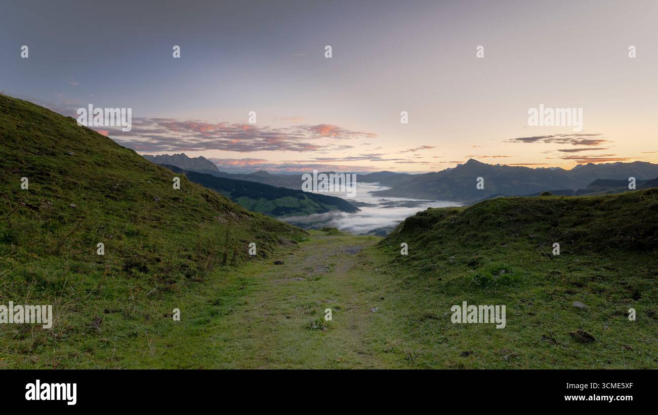 Misty alpine scene early hi-res stock photography and images - Alamy