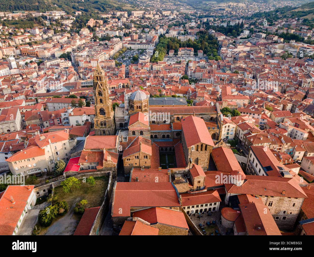 High-angle aerial view of the Romanesque Cathedral of Le Puy-en-Velay ...