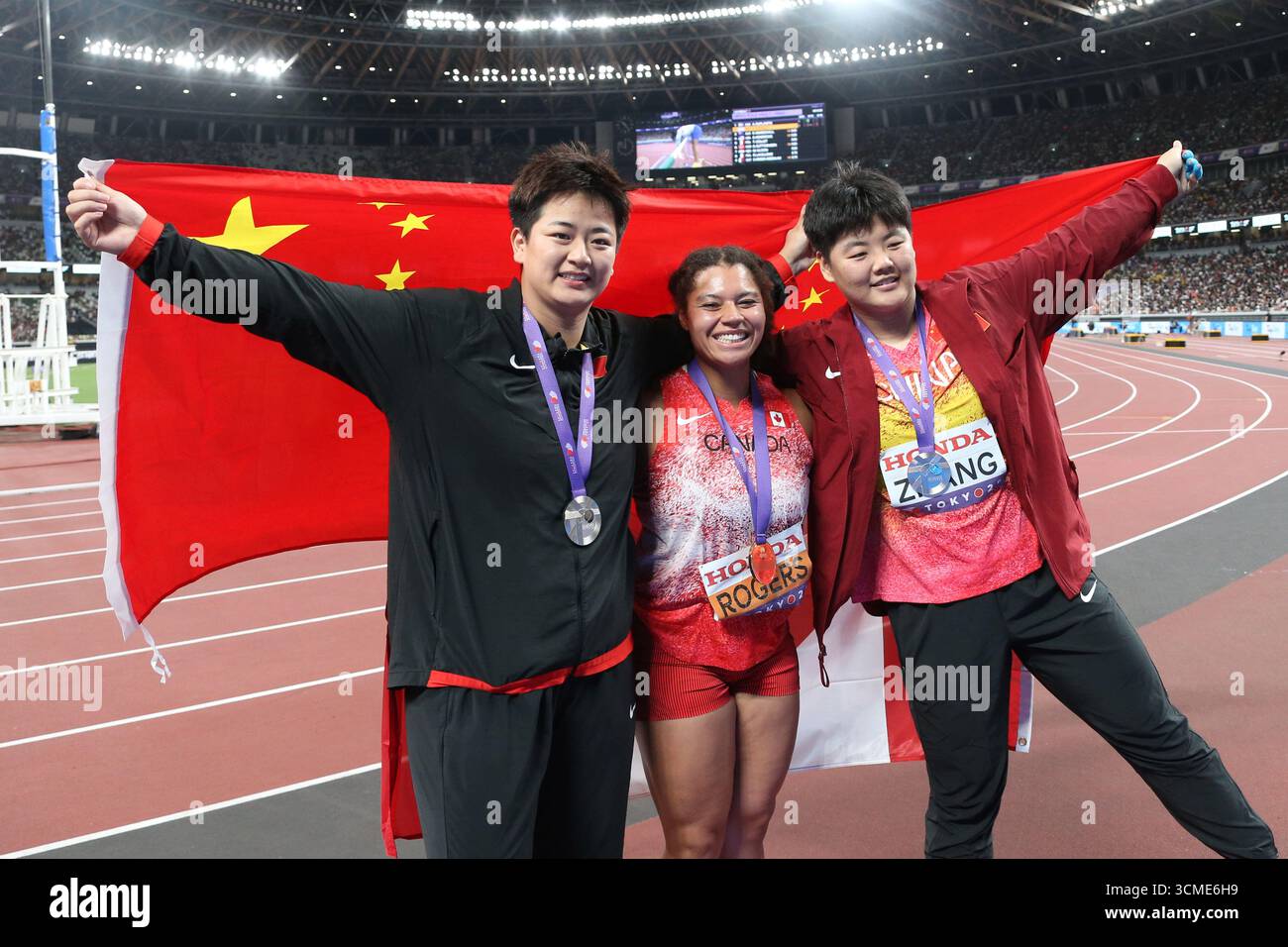 Women's hammer throw medalists Camryn Rogers (CAN), gold, center, poses with Jie Zhao (CHN ...