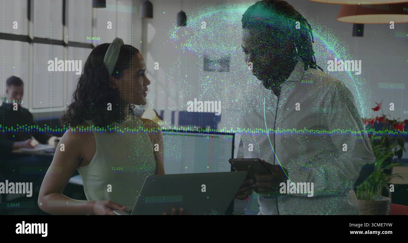 Collaborating two office professionals analyzing digital data overlay ...