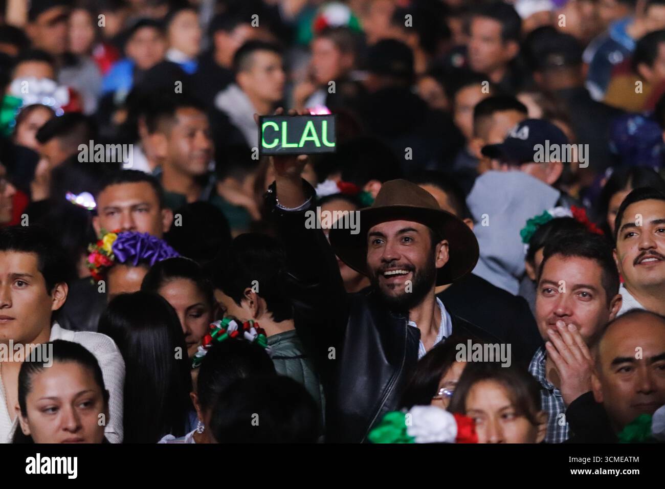 People attend the Grito de Dolores (Cry of Dolores), presided over by ...