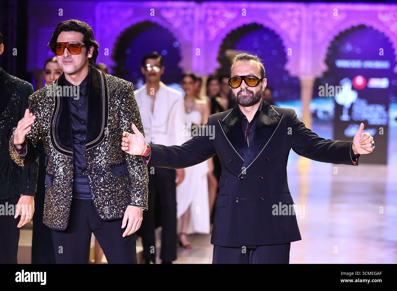 Actor Zayed Khan is with designer Wrickie Angrish during the Fashion ...