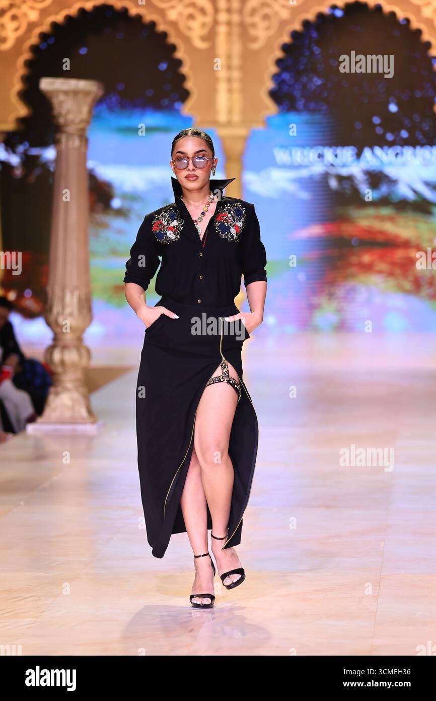 A model walks the ramp showcasing designer Wrickie Angrish's collection ...