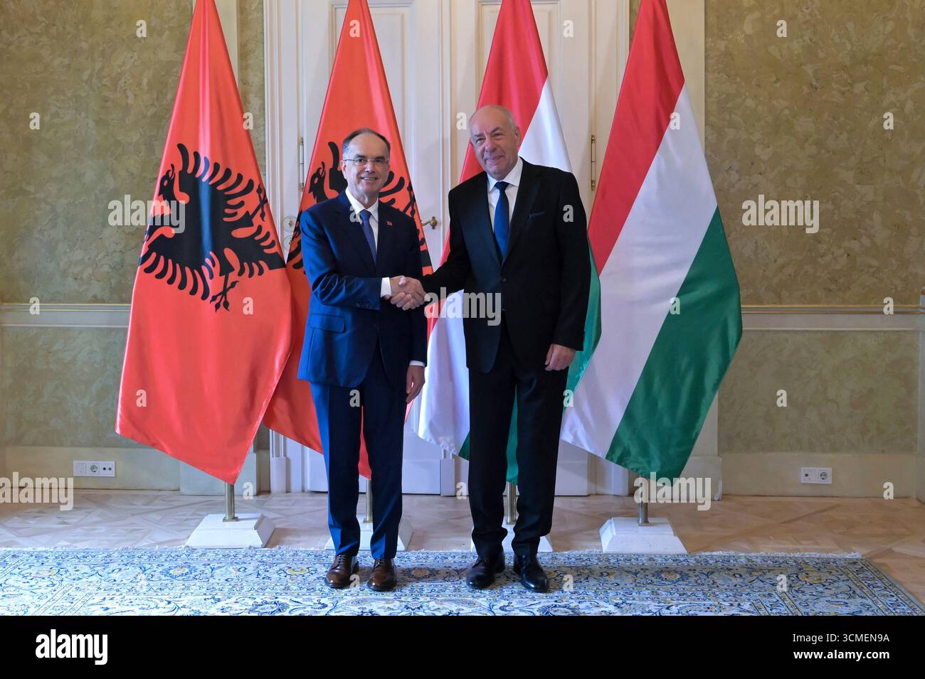 Hungarian President Tamas Sulyok, right, welcomes the President of ...